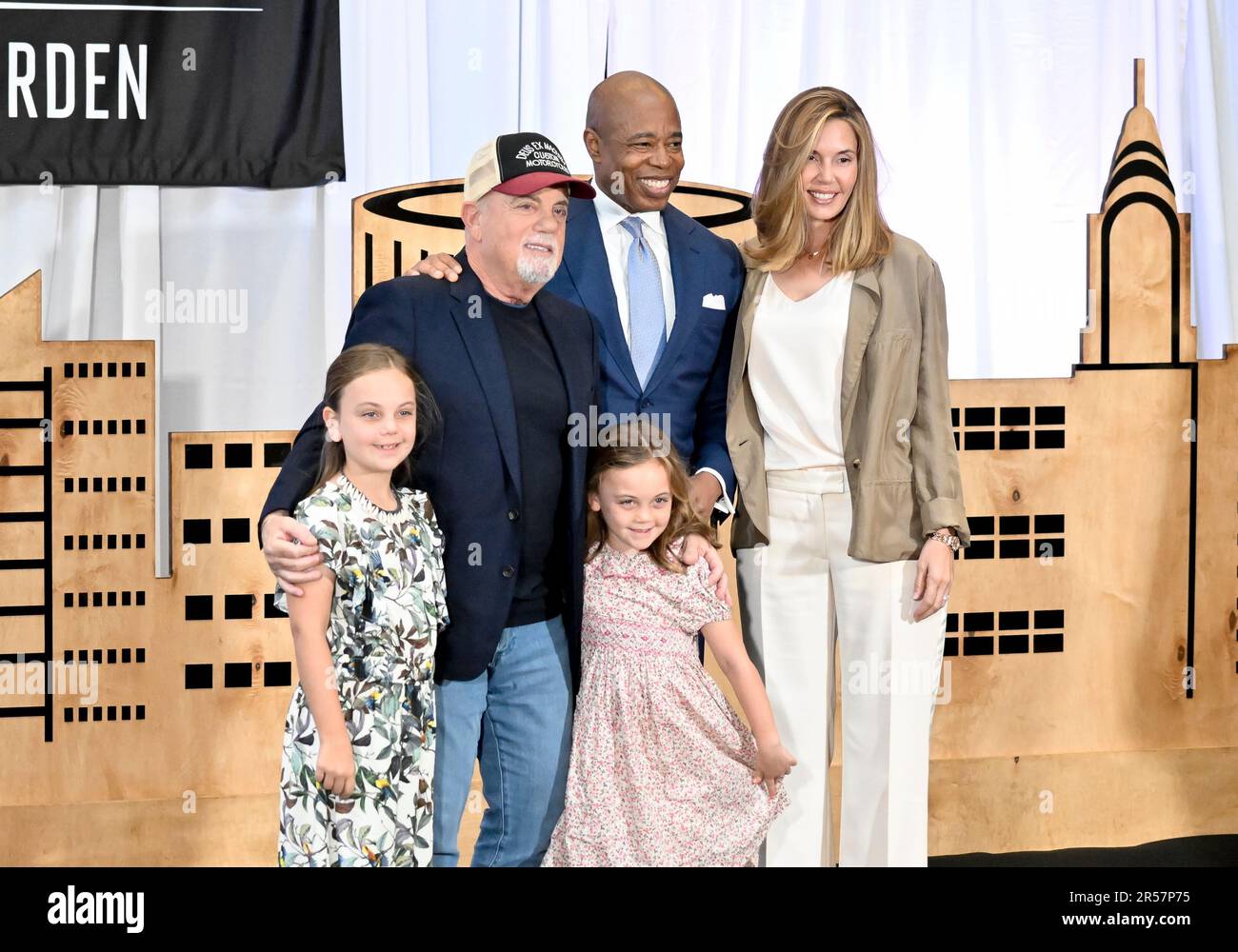 Billy Joel, left, poses with daughters and wife Alexis Roderick and New ...