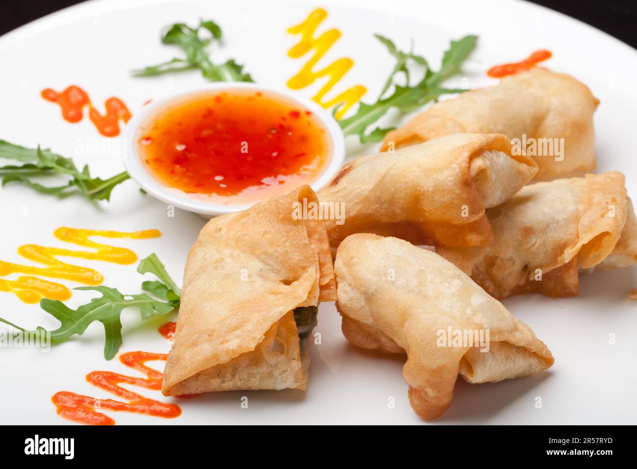 Spring Rolls with sauce on the plate Stock Photo - Alamy