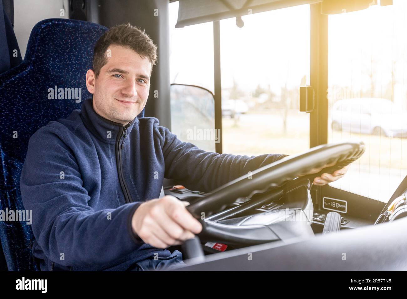 Portrait of handsome bus driver of public transport, concept of urban ...