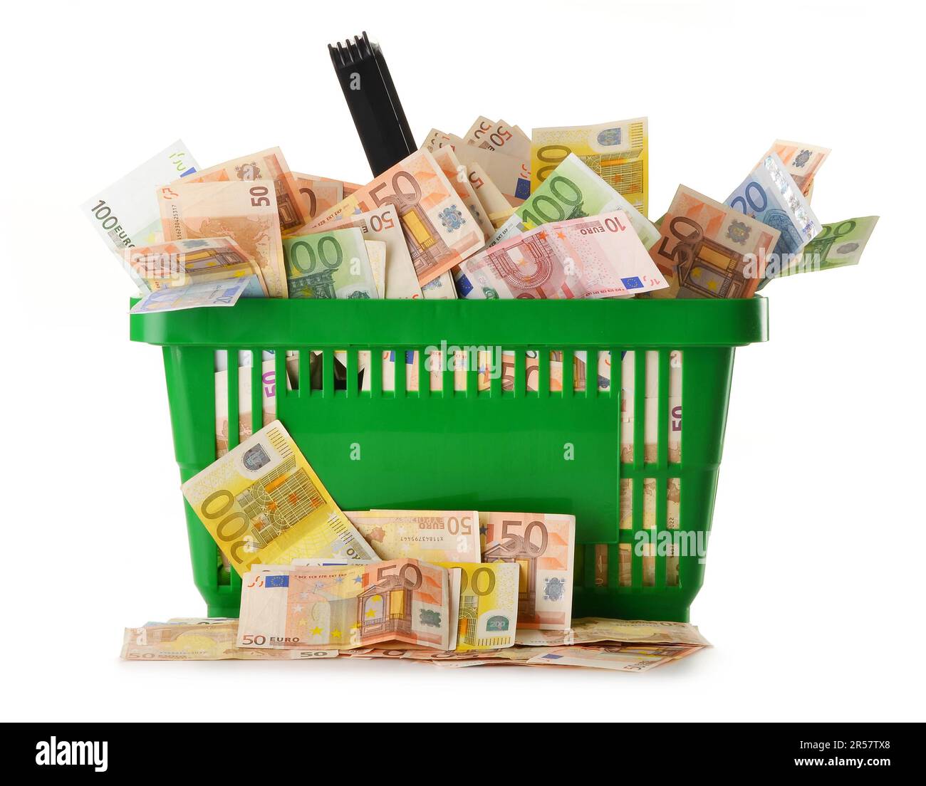 Composition with Euro banknotes in shopping basket. European Union ...