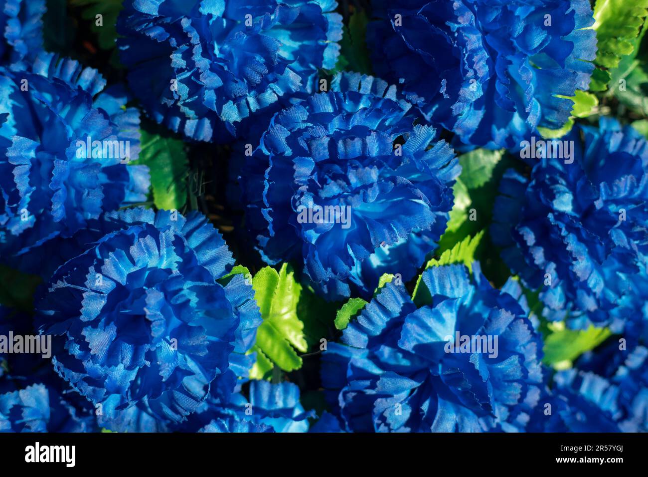 Blue flowers. Blue artificial flowers. Texture of buds. Wreath Details ...