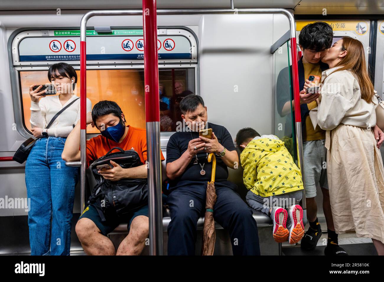 Passengers On A MTR Train, Hong Kong, China Stock Photo - Alamy