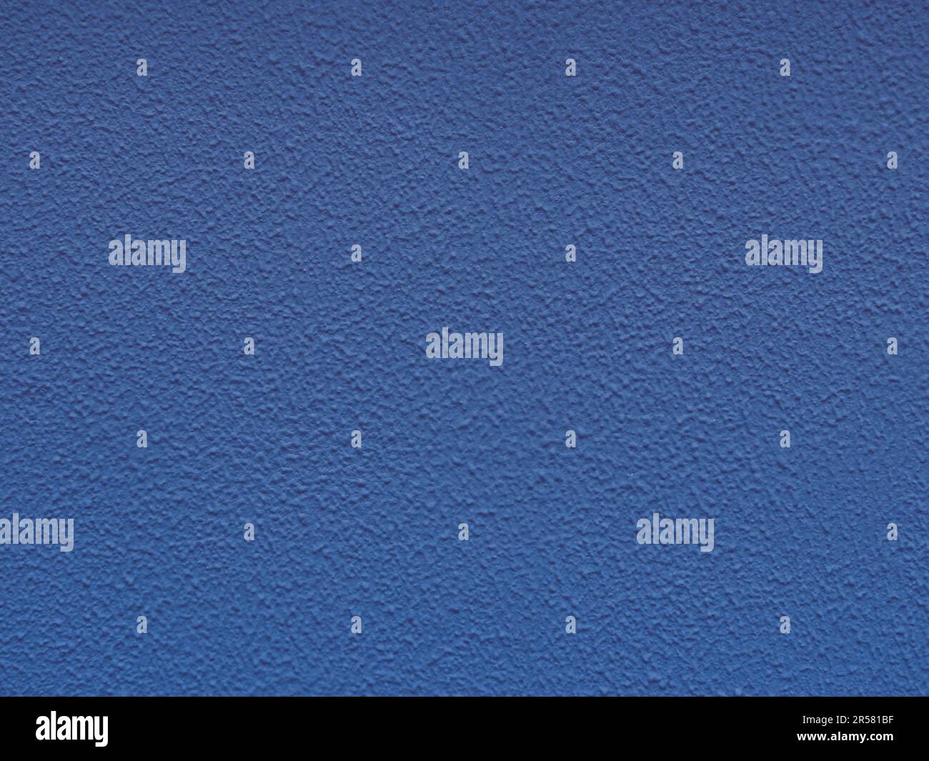 Blue backdrop with ornament.. Paper texture. Dark blue stucco surface ...