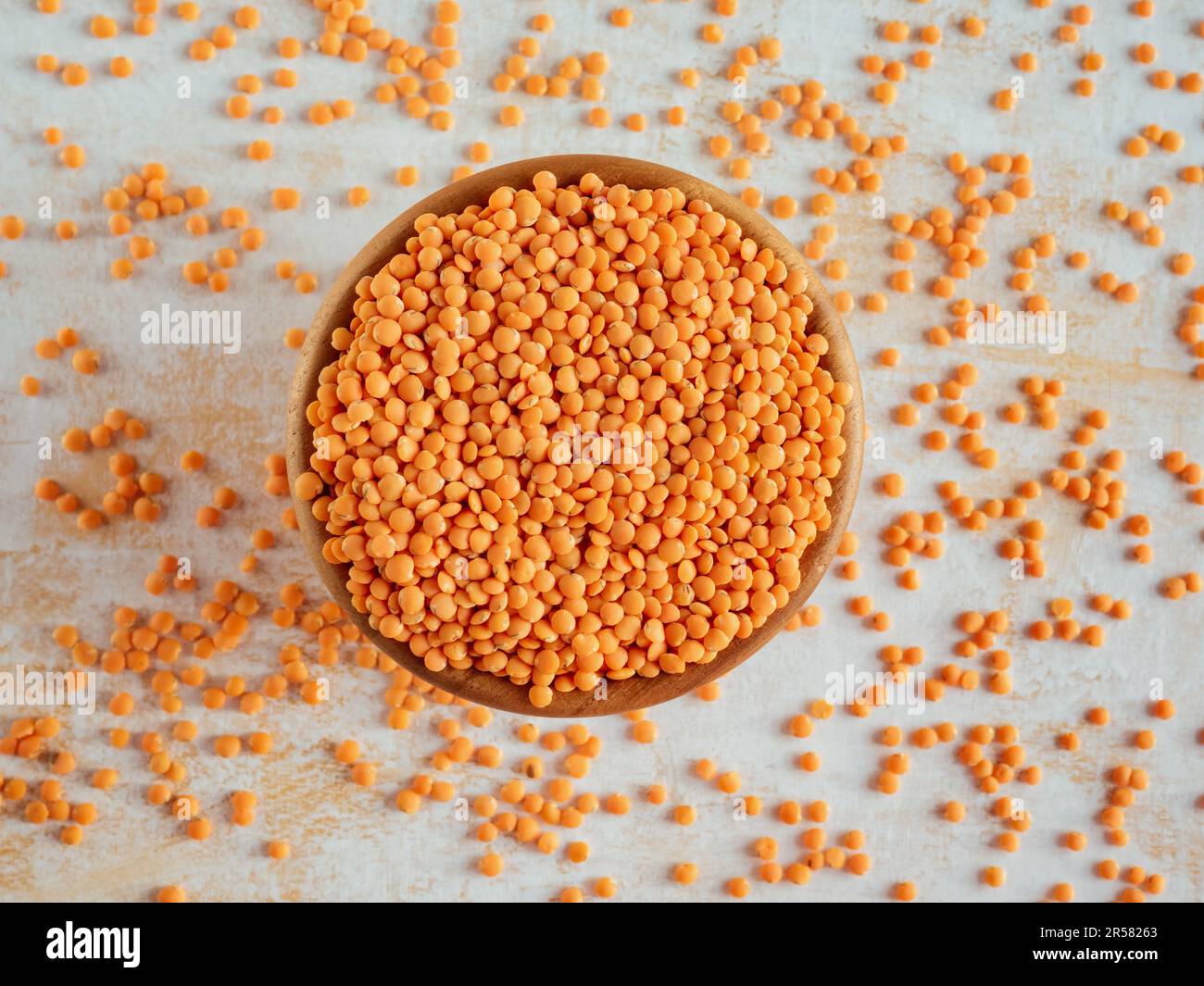 Healthy eating and dietary. Bowl of raw red lentil on white wooden ...
