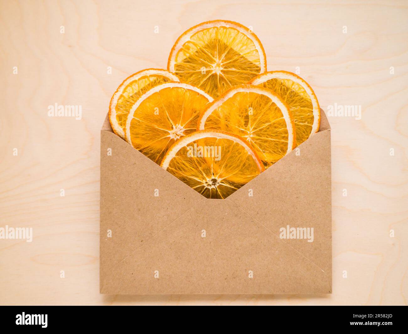 Eco organic healthy food concept. Homemade dried orange slices, chips ...