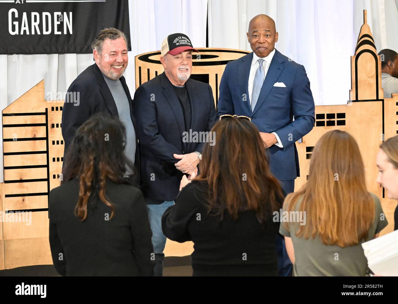 Billy Joel, center, poses with MSG Entertainment executive chairman and ...