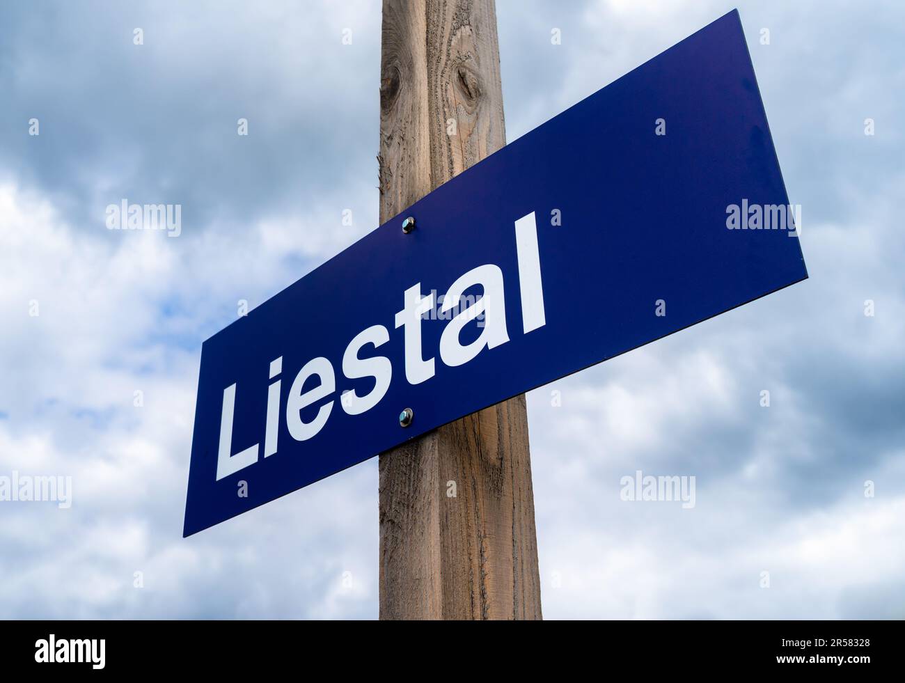 A railway station sign of the town of Liestal, a Swiss municipality and ...