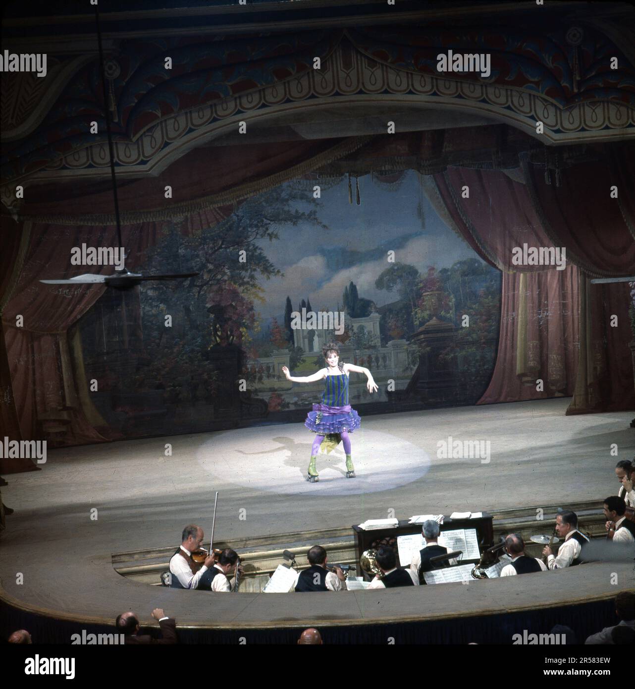 BARBRA STREISAND as Fanny Brice roller skating on stage in FUNNY GIRL ...