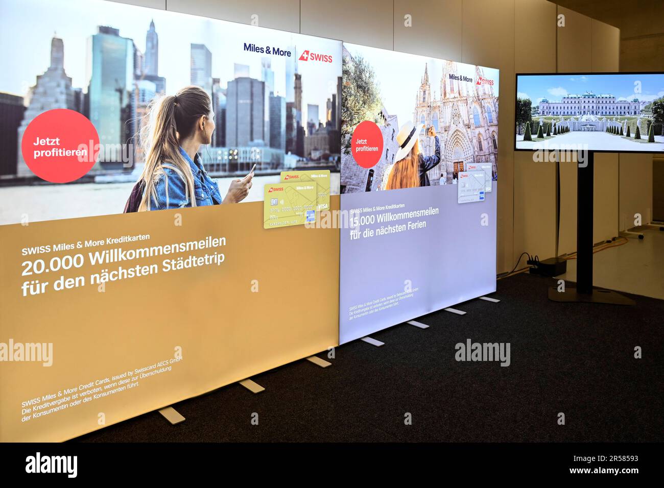 Exhibition stand Swiss Miles & More credit cards Stock Photo - Alamy