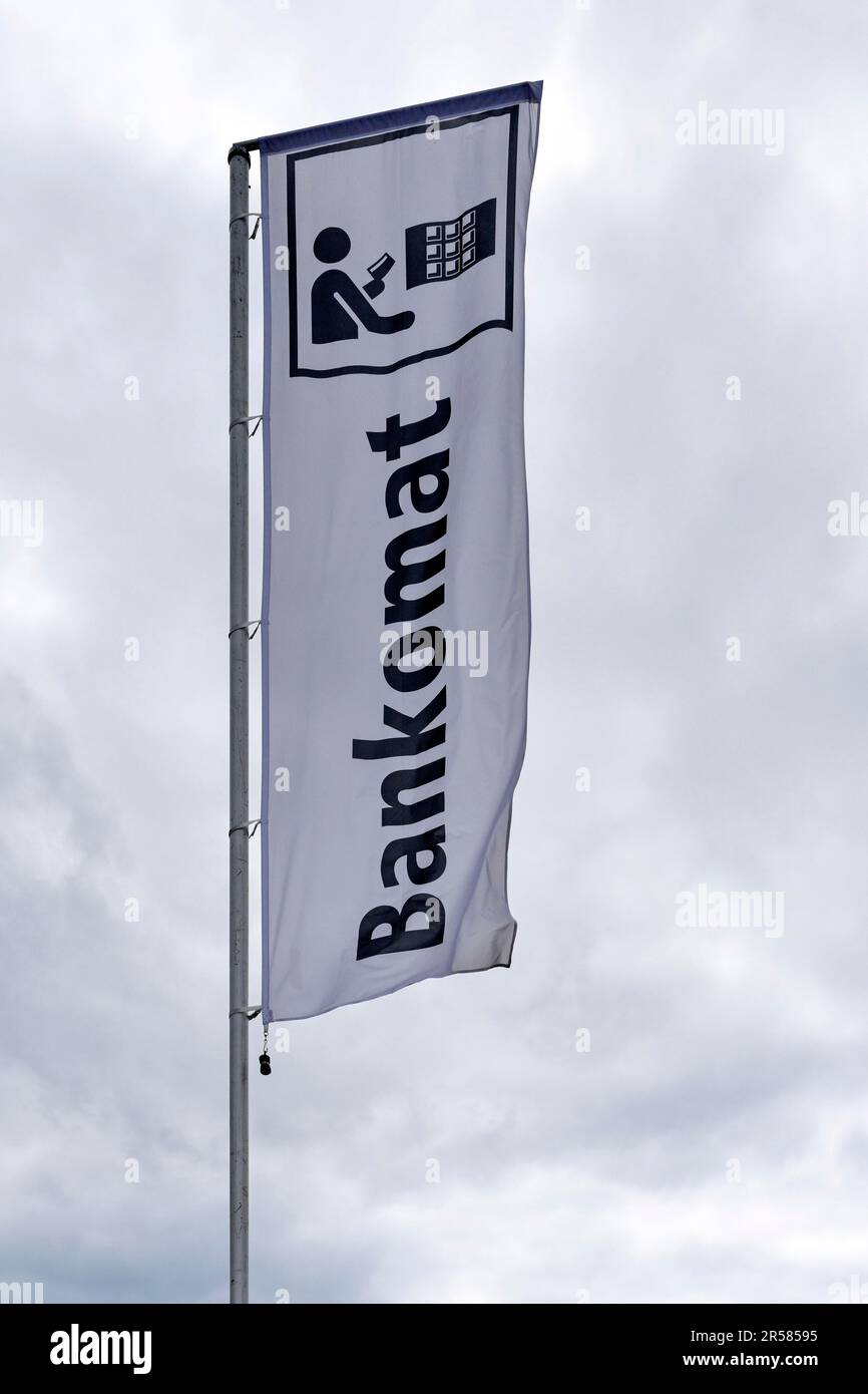 Advertising flag ATM Stock Photo - Alamy