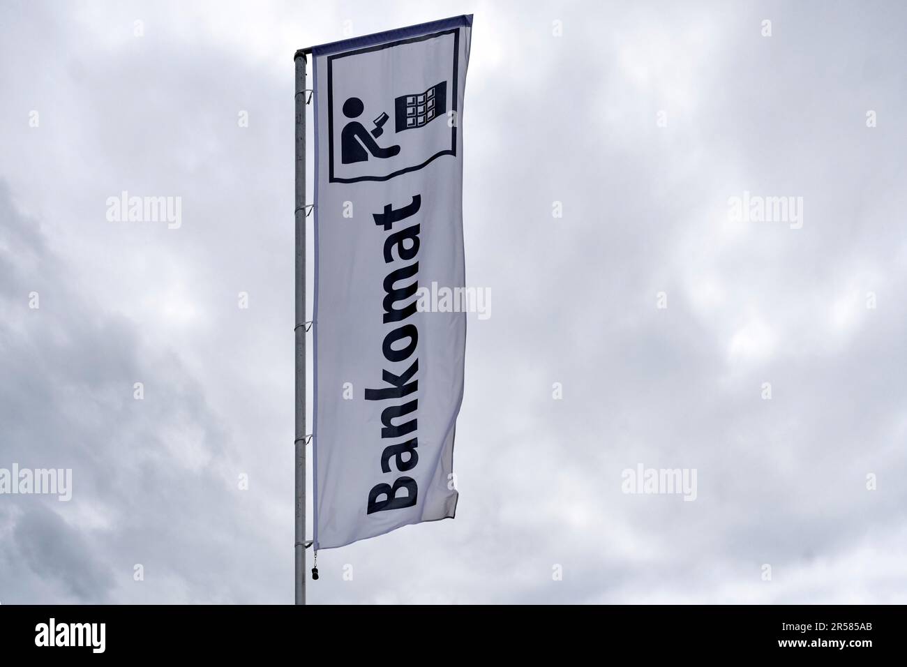 Advertising flag ATM Stock Photo - Alamy