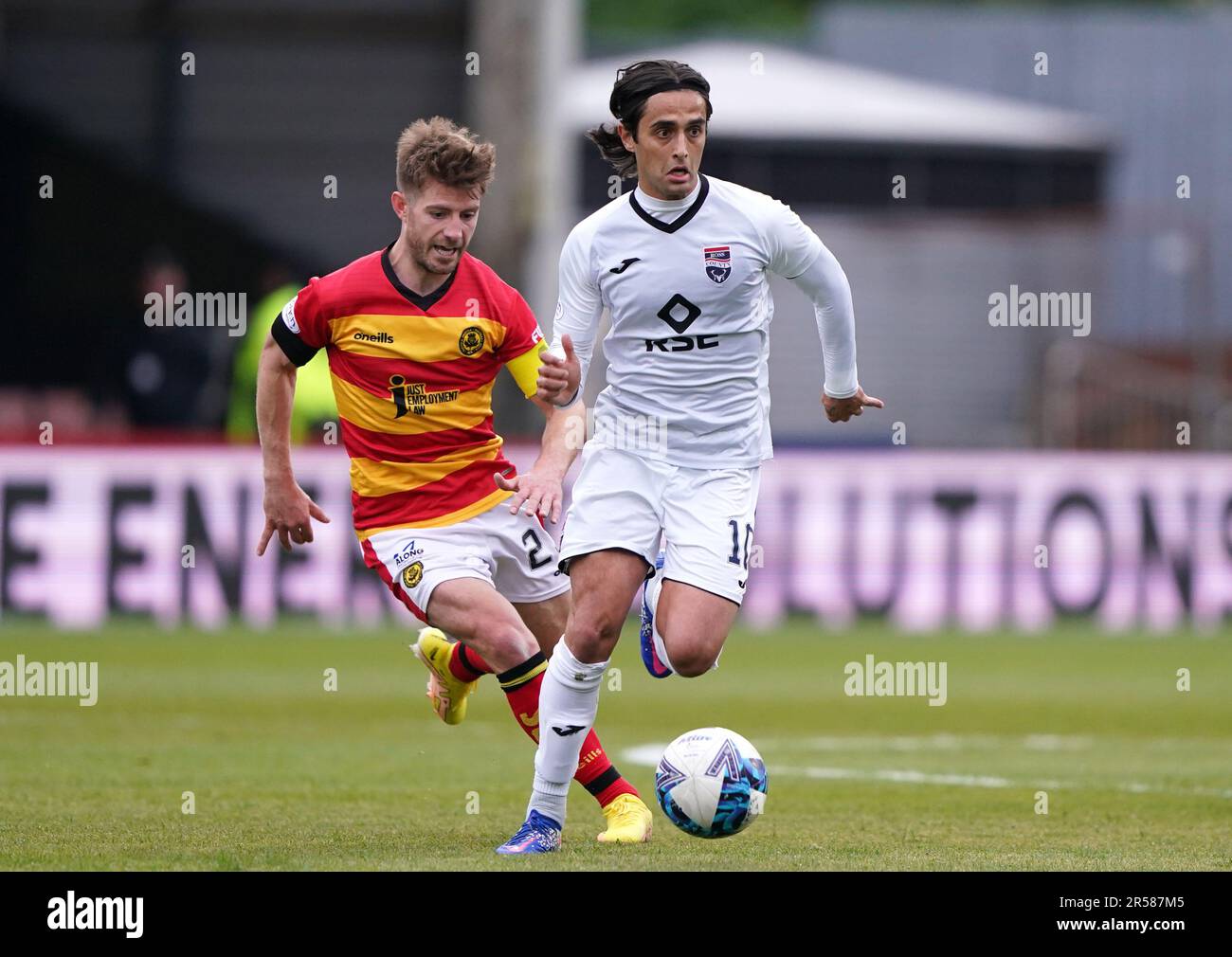 Partick Thistle's Ross Docherty (left) and Ross County's Yan Dhanda in ...