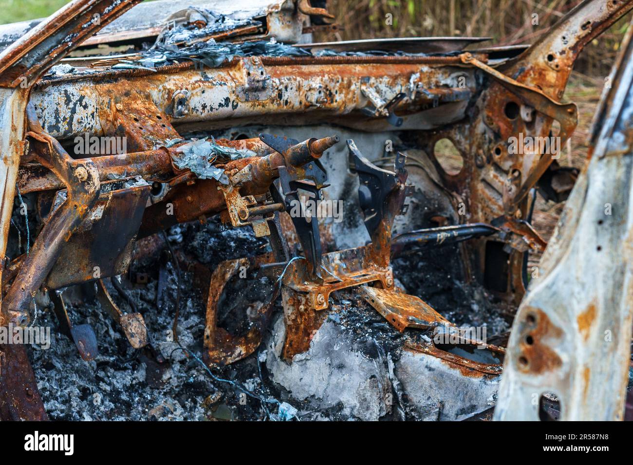 A burnt-out car. Car old burned by fire. Fire burned car Stock Photo ...