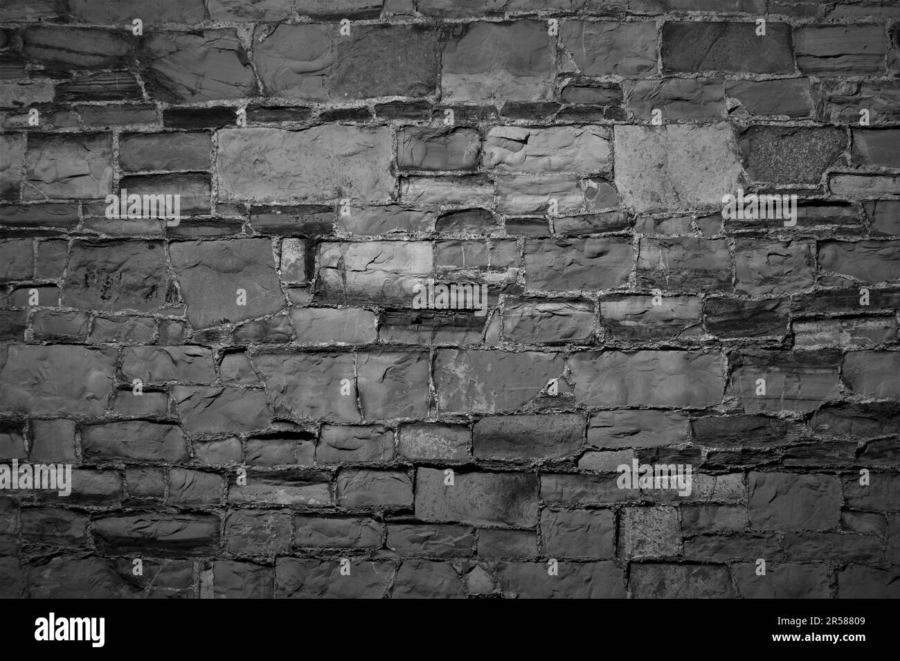 Black and white background. Decorative wall made of natural stones ...