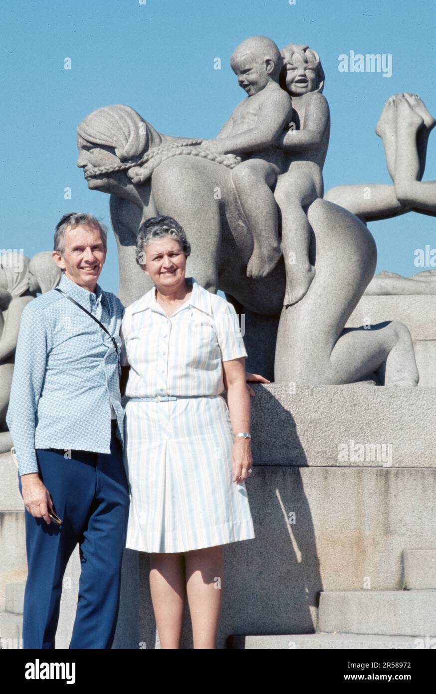 Oslo, Norway- September 1973: Vintage 1970s couple in front of statues ...