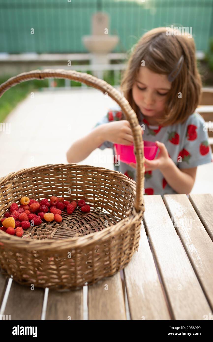 Child eating plant hi-res stock photography and images - Alamy