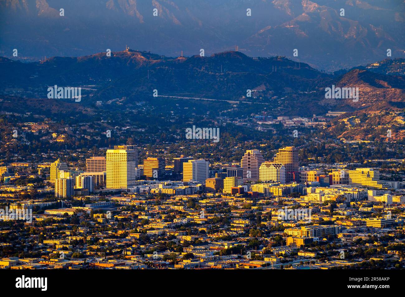 Sunset above downtown Glendale and San Gabriel Mountains in California ...