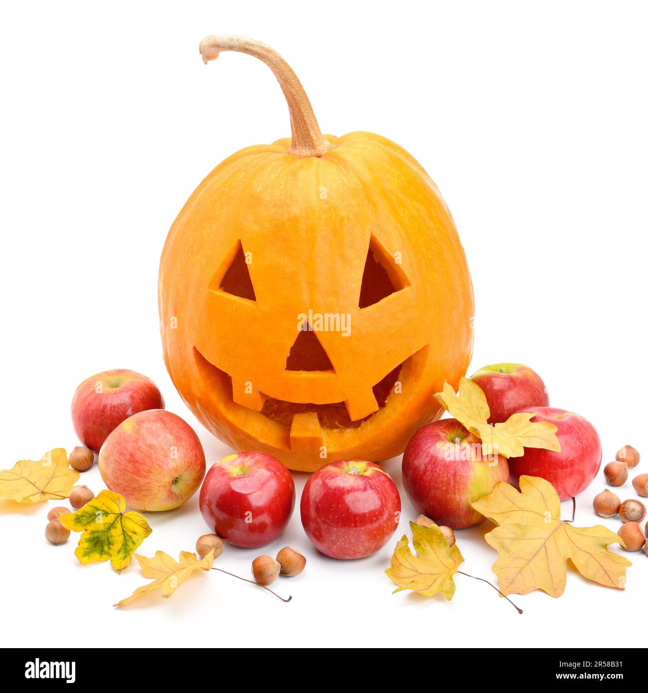 Pumpkin-head, nuts, apples and yellow leaves isolated on white ...