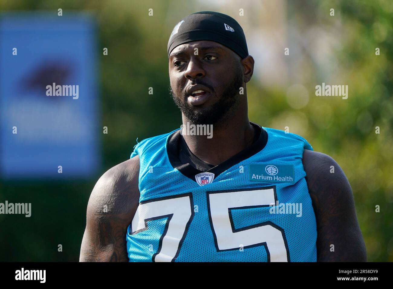 Carolina Panthers offensive tackle Cameron Erving (75) walks to the ...