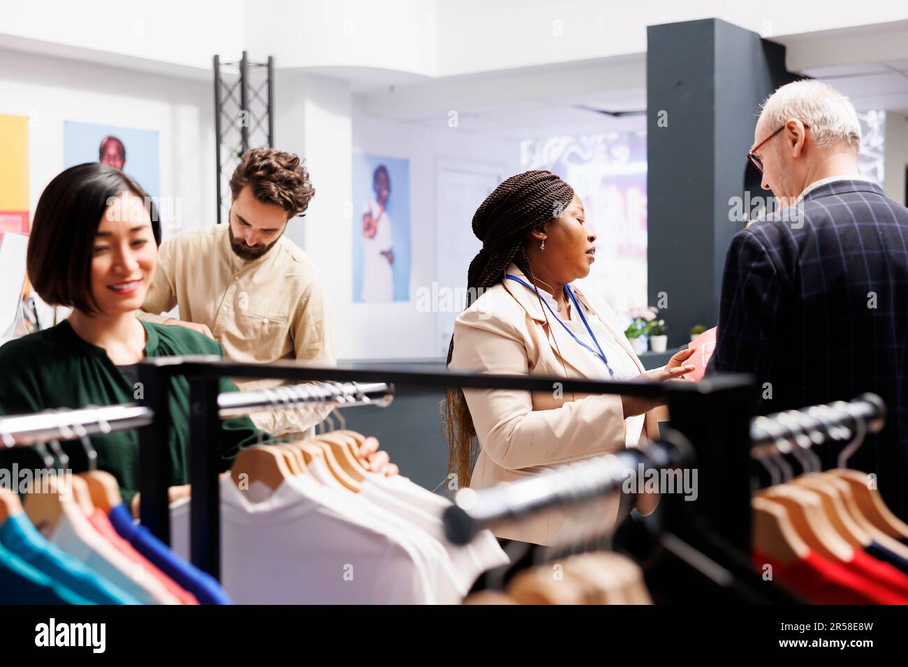 African American woman retail worker talking with customer about ...