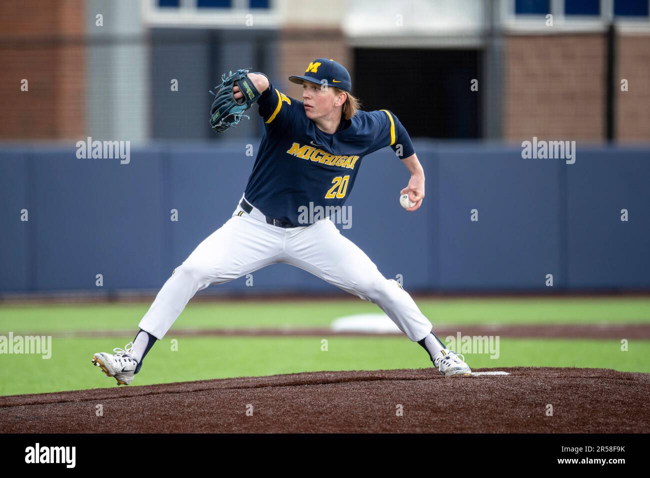 Michigan Wolverines pitcher Connor O'Halloran (20) delivers a pitch ...