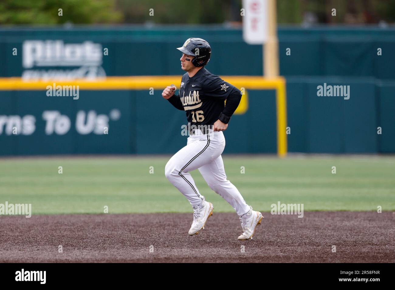 Vanderbilt Commodores catcher Jack Bulger (16) circles the bases after ...
