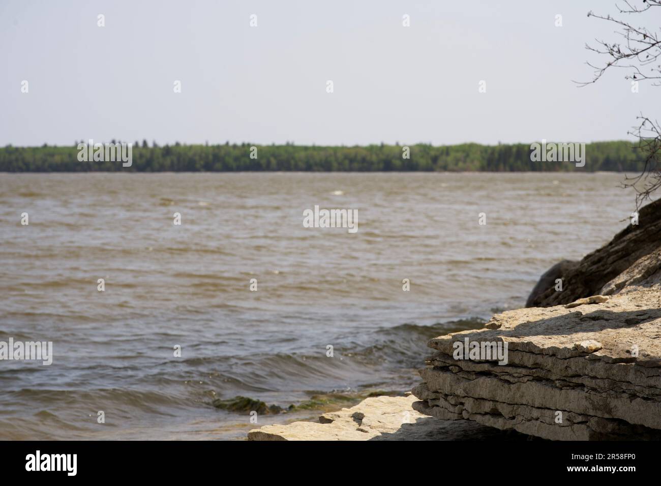 Limestone rock ledge looking outward to Lake Winnipeg in Pine Dock ...