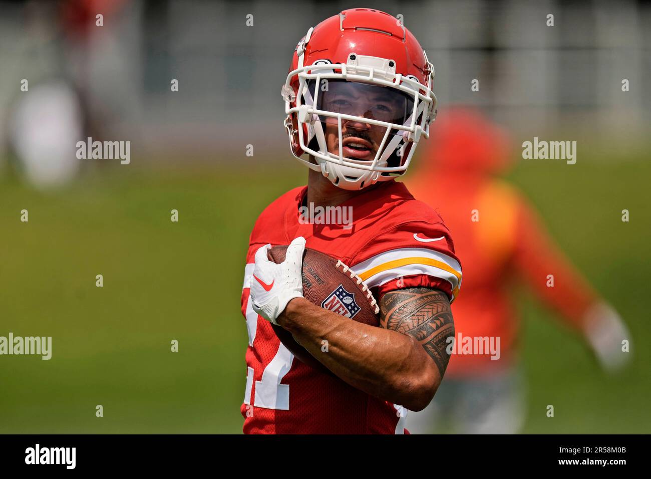 Kansas City Chiefs wide receiver Nikko Remigio runs with the ball ...