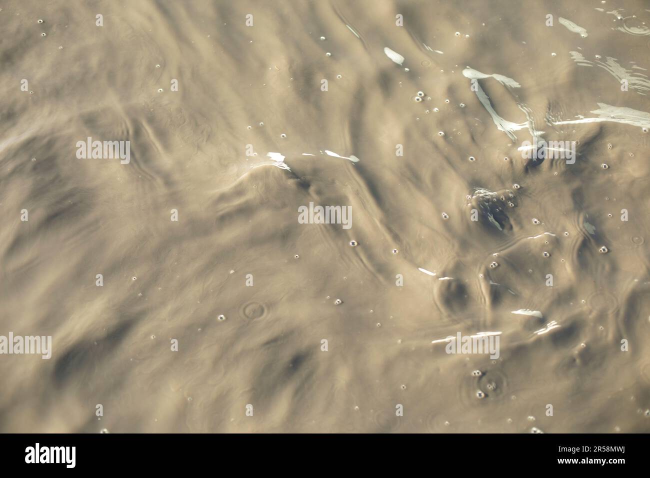 Dirty water. Puddle texture. Waves on surface. Cloudy liquid Stock ...