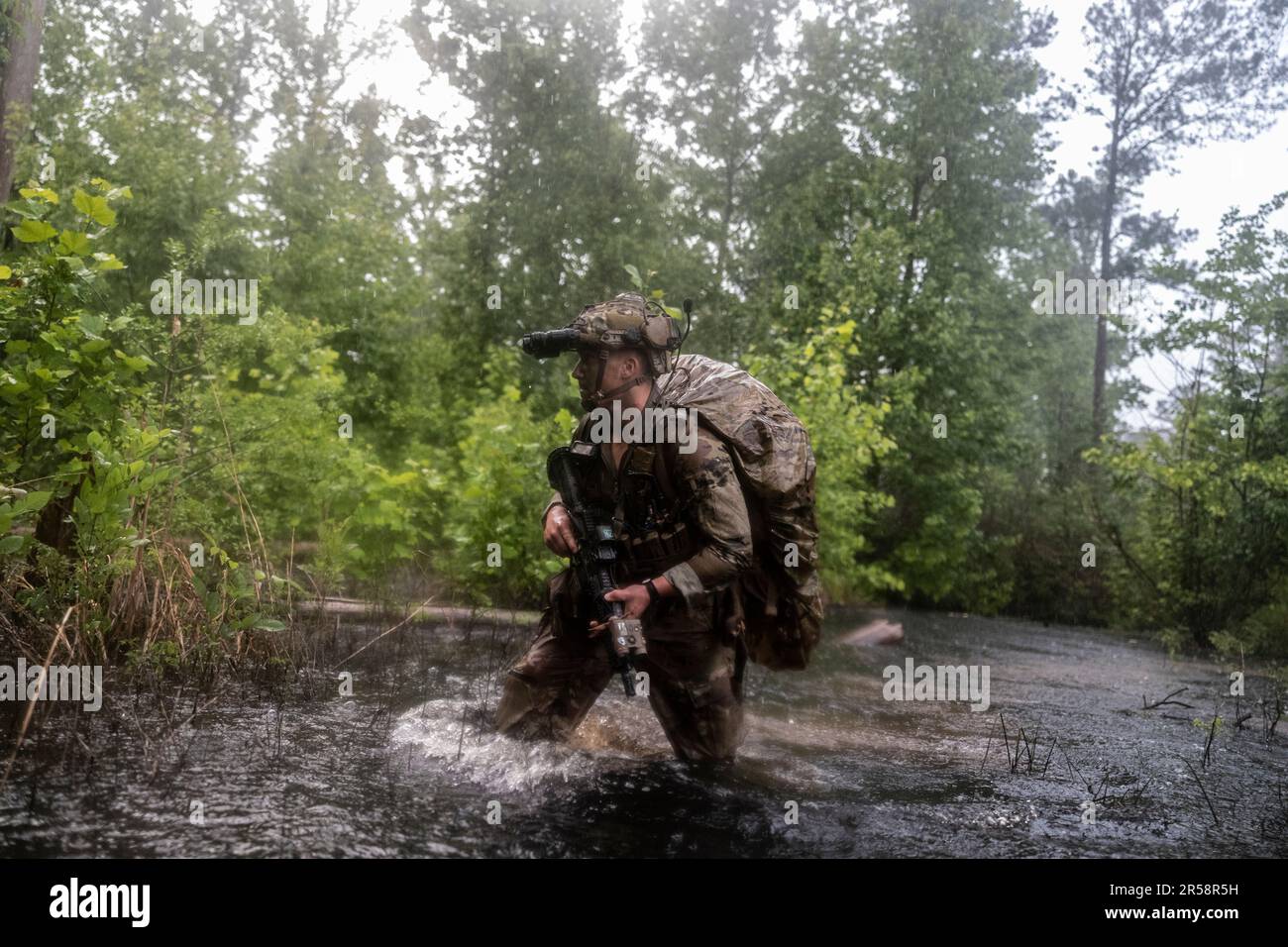 A U.S. Marine assigned to Bravo Company, 2nd Recon Battalion, 22nd ...
