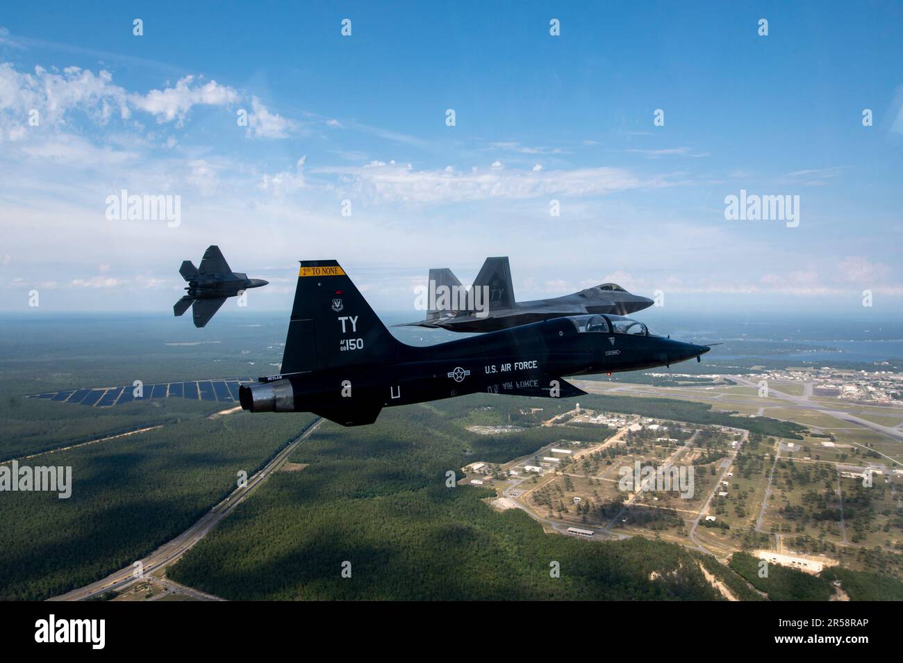 U.S. Air Force F-22 Raptors assigned to the 43d Fighter Squadron and a ...