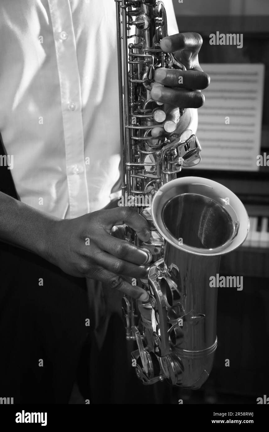 Old man playing saxophone Black and White Stock Photos & Images - Alamy