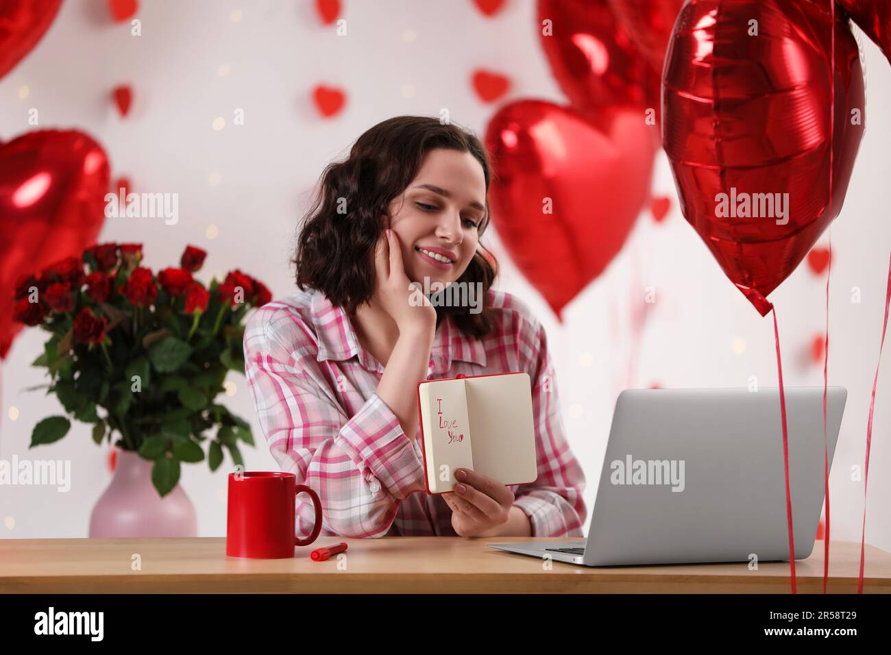 Valentine's day celebration in long distance relationship. Woman having ...