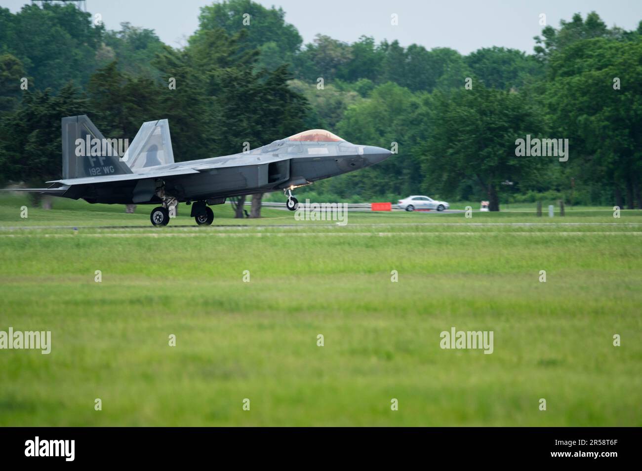 An F-22 Raptor lands on the Scott Air Force Base, Illinois, flightline ...