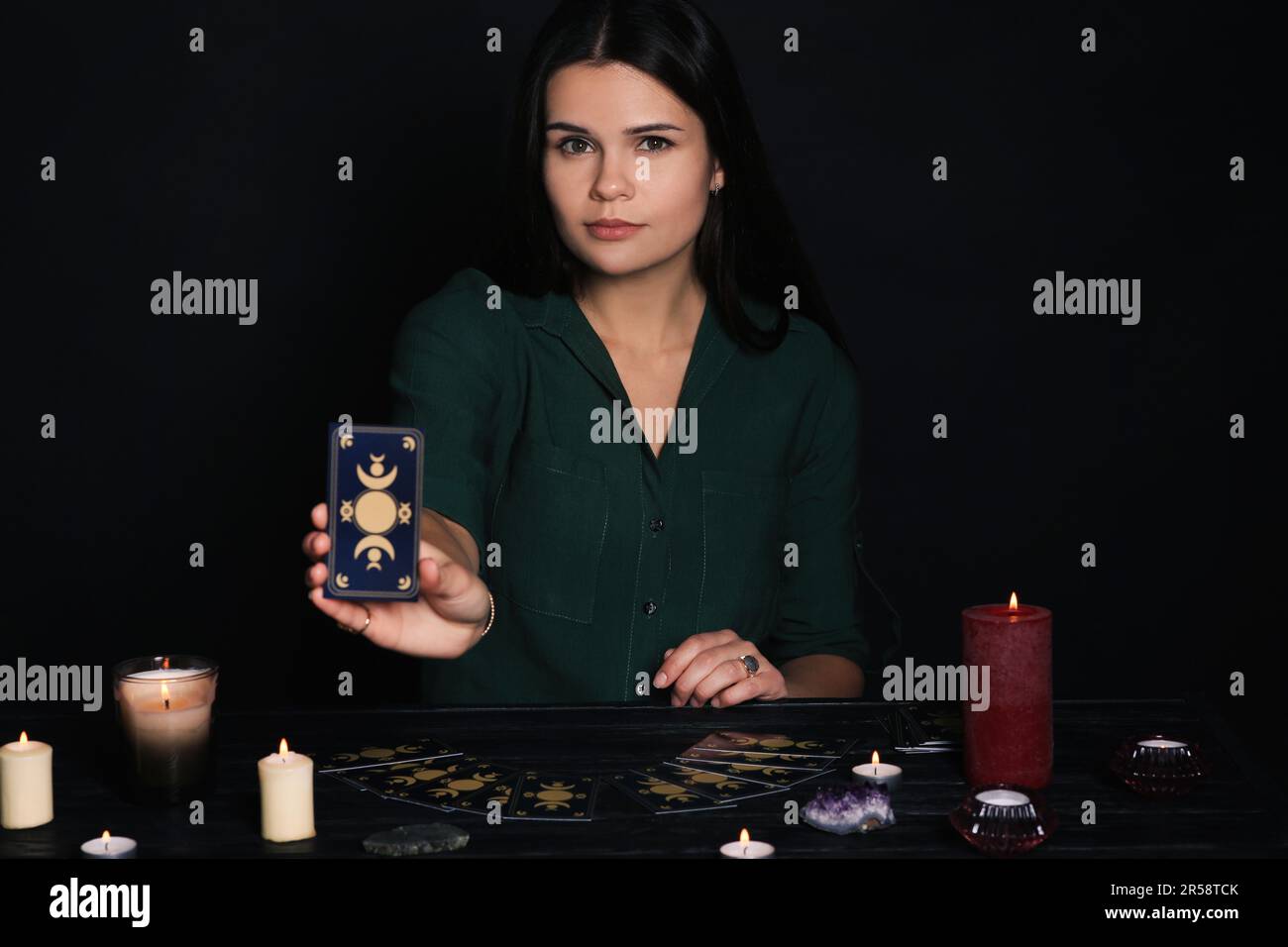 Soothsayer showing tarot card hi-res stock photography and images - Alamy