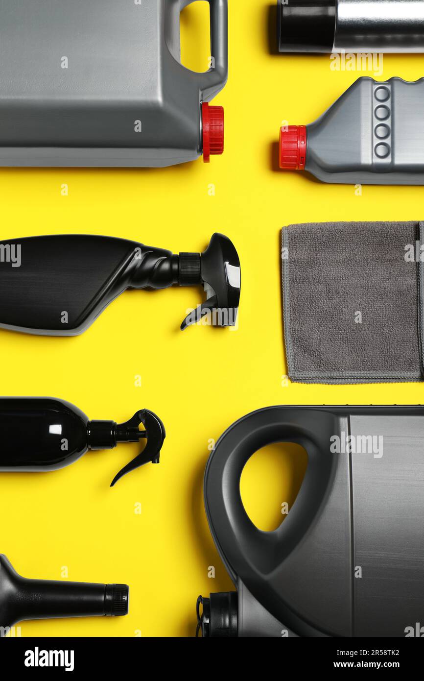 Different car products on yellow background, flat lay Stock Photo - Alamy