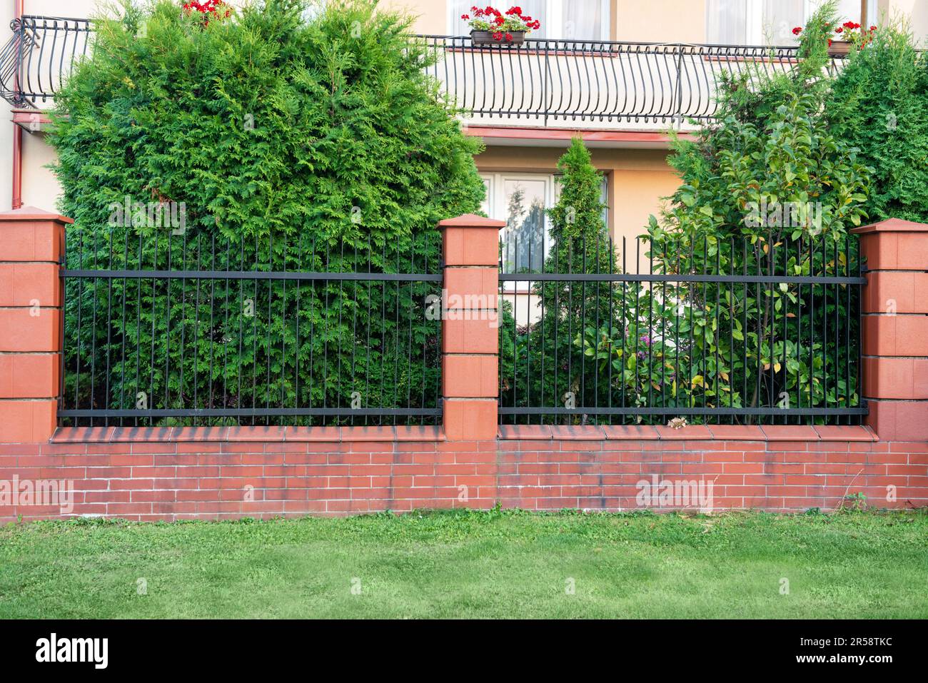 Iron Fences With Brick Walls