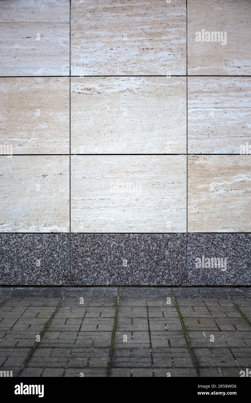 View on urban tiled wall and pavement Stock Photo - Alamy