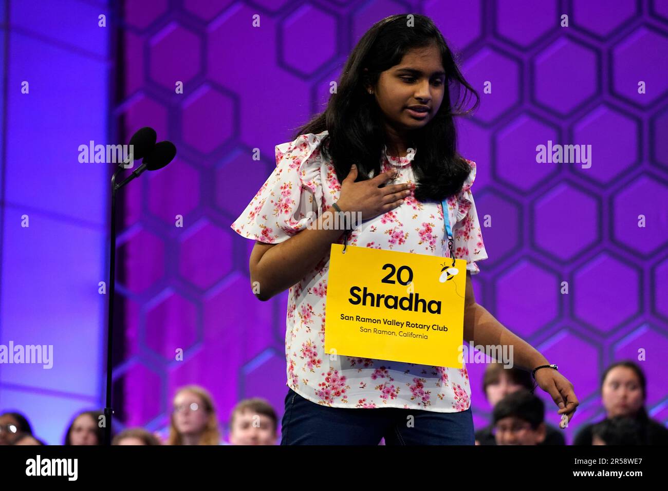 Shradha Rachamreddy, 13, from San Jose, Calif., reacts after spelling her word correctly during ...