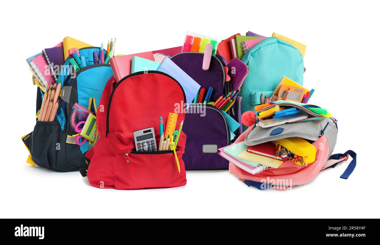 Set with different backpacks and school stationery on white background ...