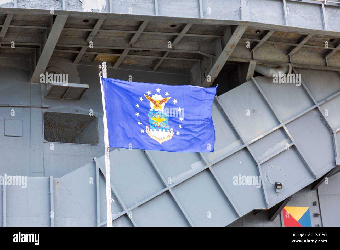 The United States Air Force flag flies outside the USS Yorktown at ...
