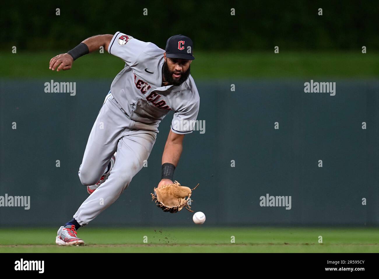 Cleveland Guardians shortstop Amed Rosario cannot make the play on an ...