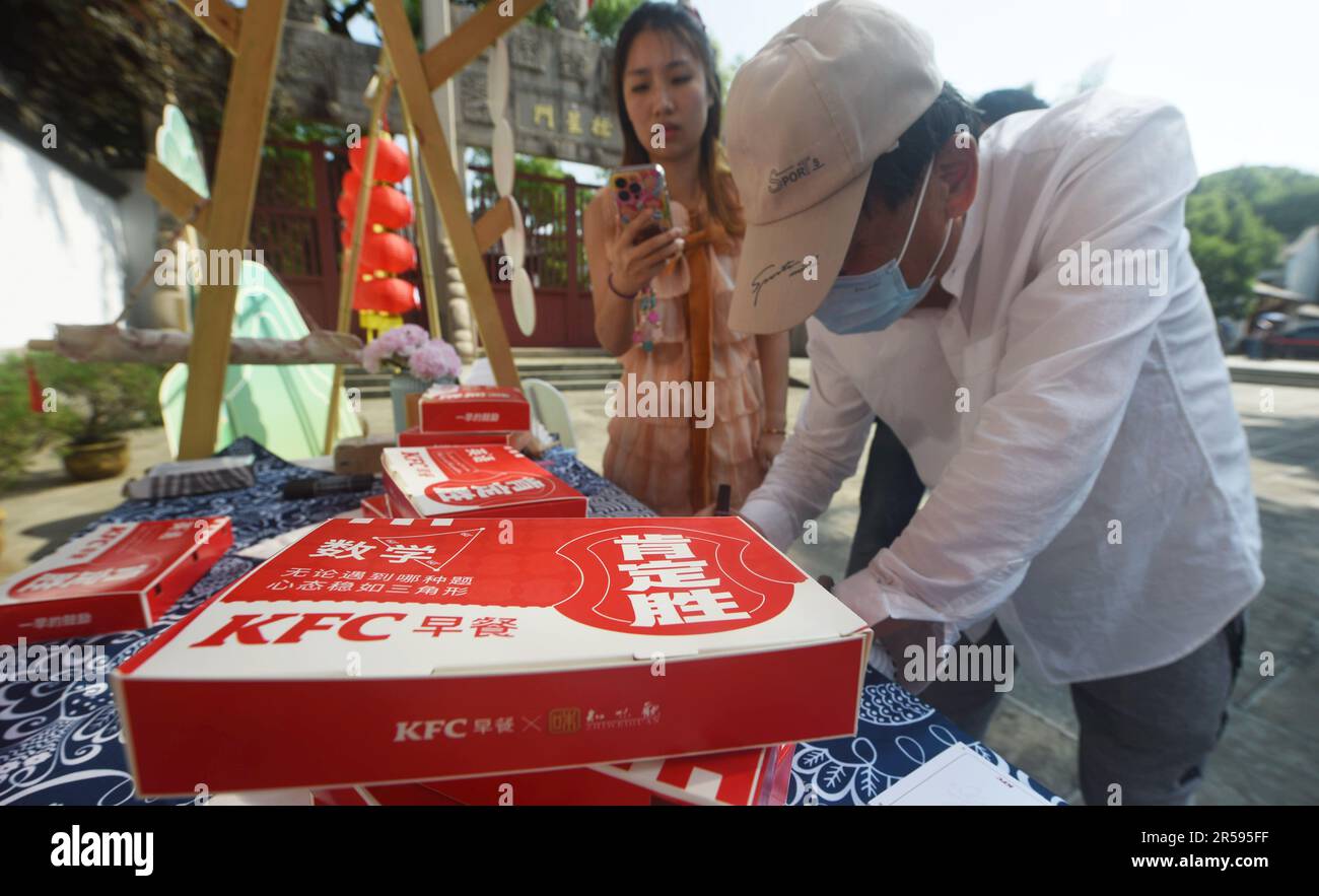 HANGZHOU, CHINA - JUNE 2, 2023 - Students' parents receive KFC's latest ...