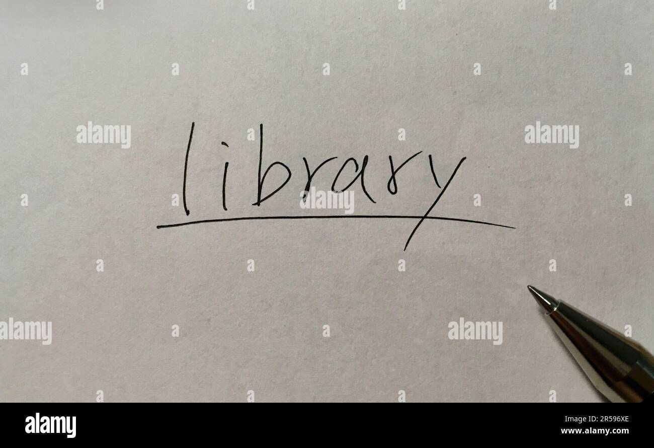 Library concept word on paper background Stock Photo - Alamy