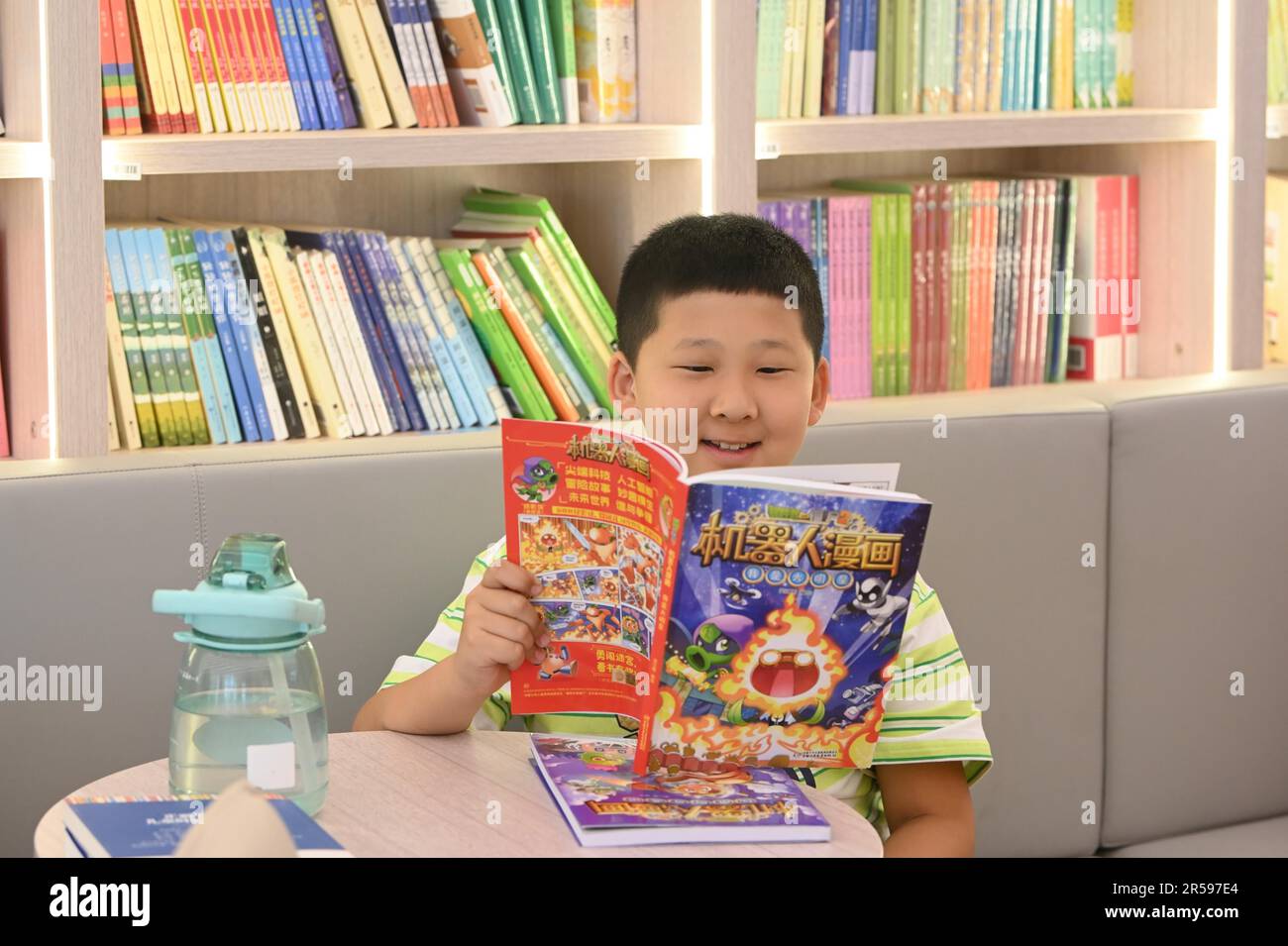 **CHINESE MAINLAND, HONG KONG, MACAU AND TAIWAN OUT** Children read ...