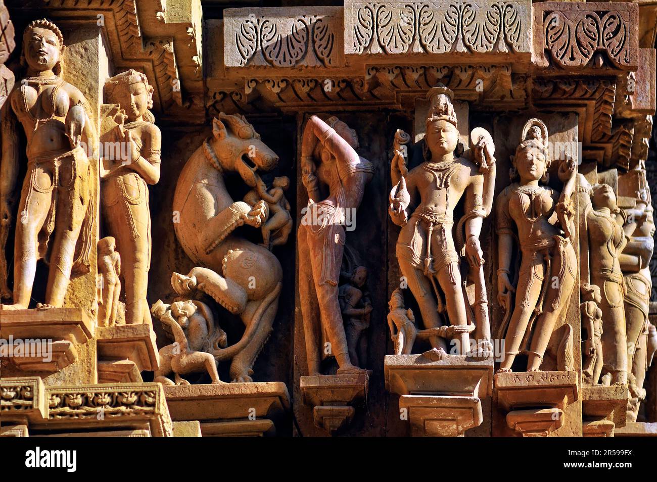 Highly ornate carved sculptures on the wall of Lakshmana Temple at ...
