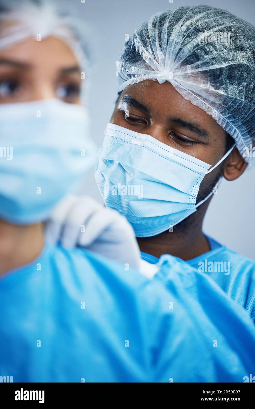 Surgery, preparation and doctor team getting ready in hospital for ...