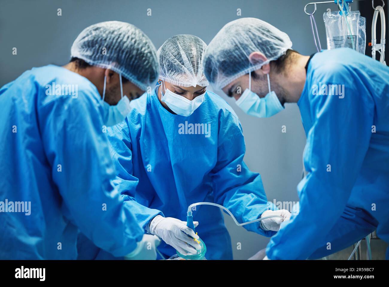 Team of doctors n surgery, health and surgical procedure start with PPE ...