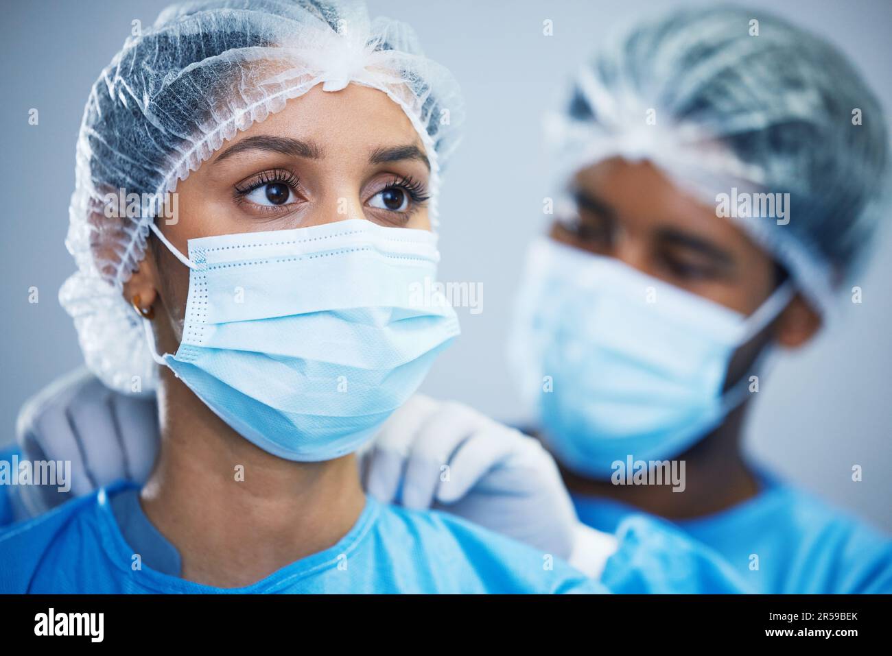 Uniform, preparation and doctor team getting ready in hospital for ...