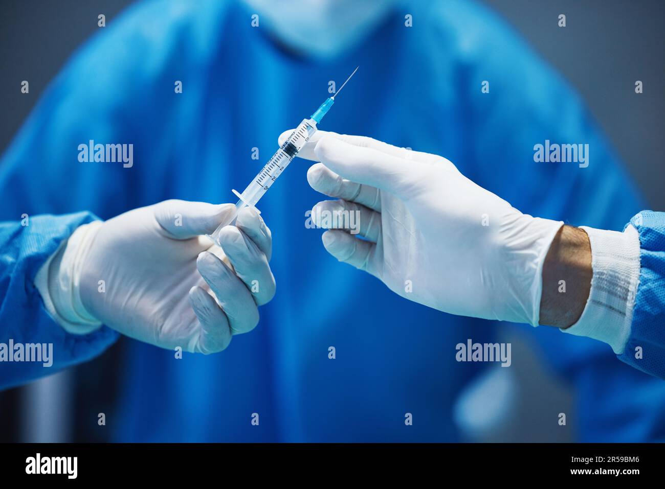 Surgery, nurse hands doctor syringe with medicine and surgical ...